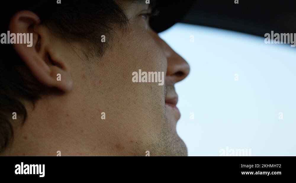 Man driving car - extreme close up on side profile of face Stock Video ...