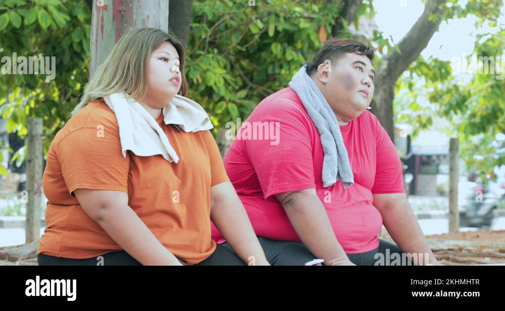 Obese couple Stock Videos & Footage - HD and 4K Video Clips - Alamy