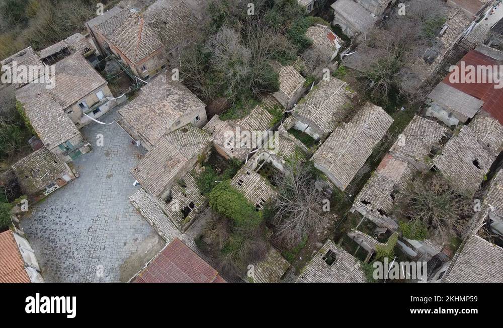 Apocalypse city Aerial View flying over a destroyed city after ...