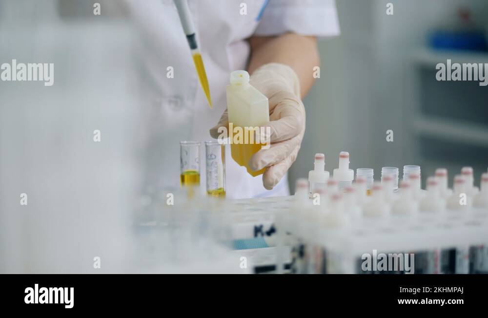 Pouring samples Stock Videos & Footage - HD and 4K Video Clips - Alamy
