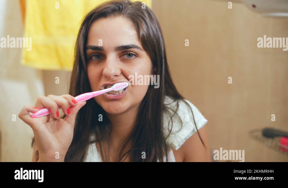 A girl brushing teeth Stock Videos & Footage - HD and 4K Video Clips ...
