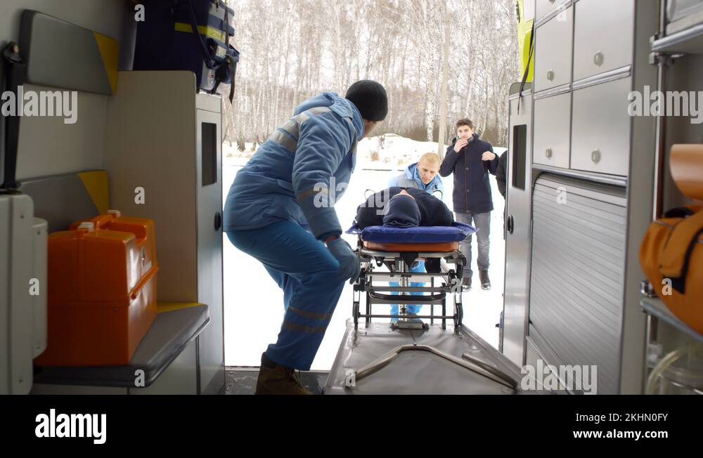 Man on ambulance stretcher Stock Videos & Footage - HD and 4K Video ...