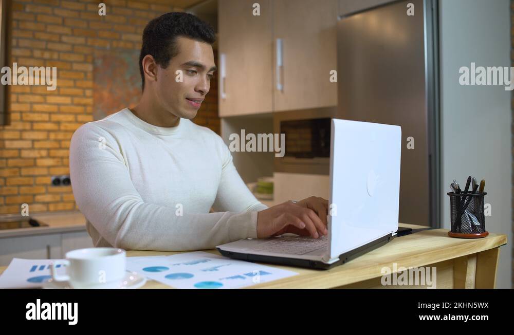 Satisfied company employee closing laptop and leaving room, end of work ...