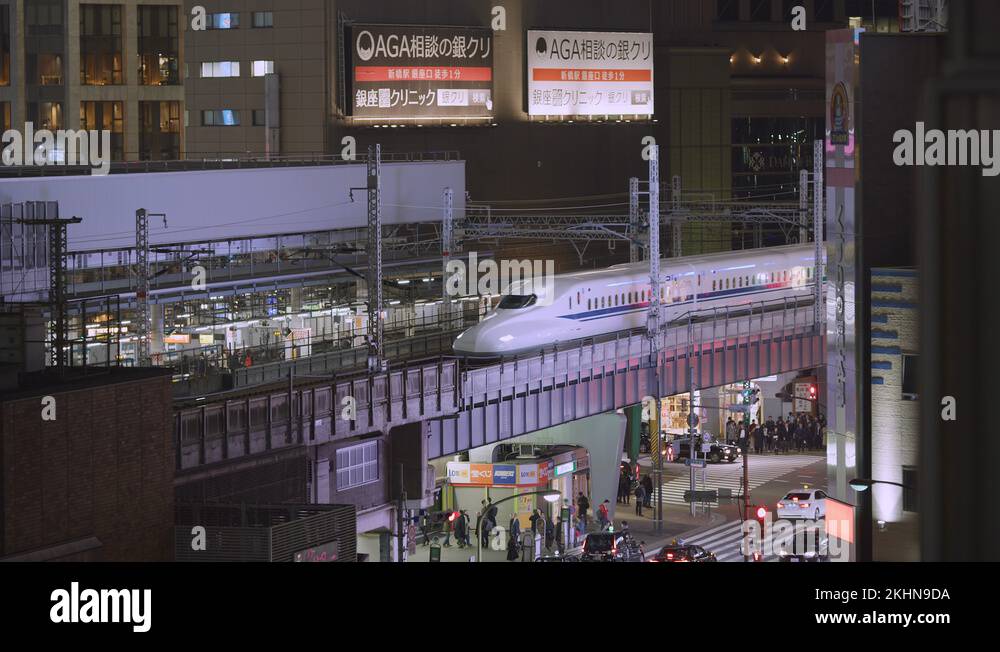 Tokyo / Japan - Circa 2020s Shinkansen Train arriving at a station at ...