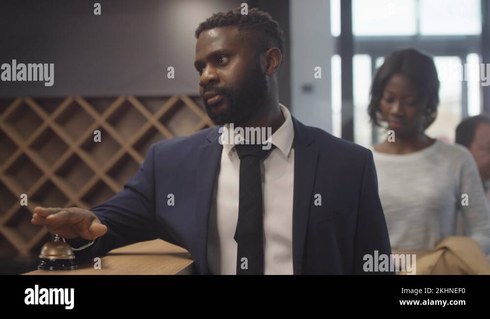 Man reception desk Stock Videos & Footage - HD and 4K Video Clips - Alamy