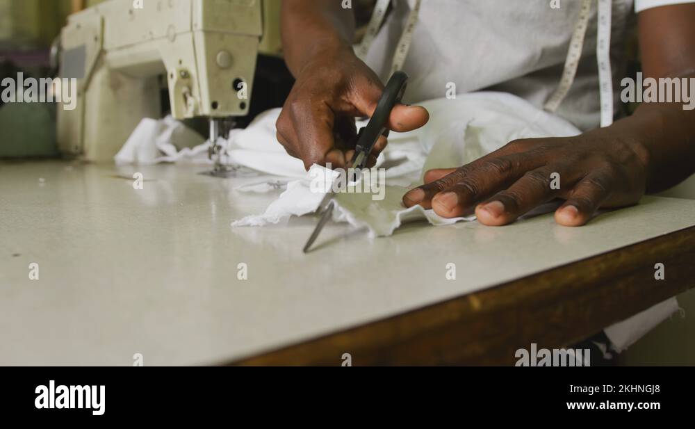 African man cutting tissue Stock Video Footage - Alamy