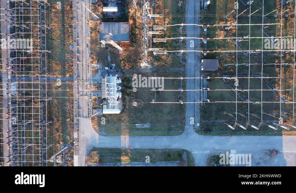 Electrical substation - transformers and a grid of lines and wires ...