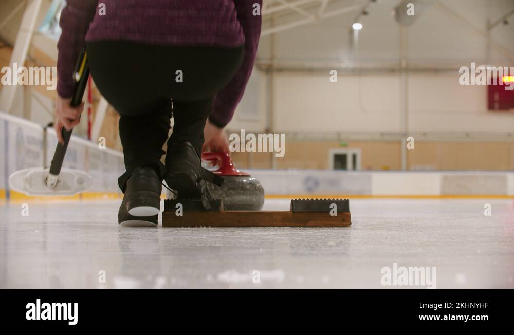 Curling stone woman Stock Videos & Footage - HD and 4K Video Clips - Alamy