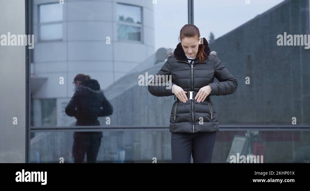 Woman taking off jacket Stock Videos & Footage - HD and 4K Video Clips ...