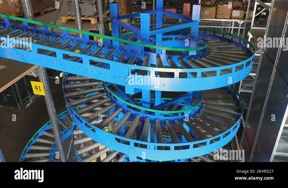Spiral Gravity Conveyors Stock Video Footage - Alamy