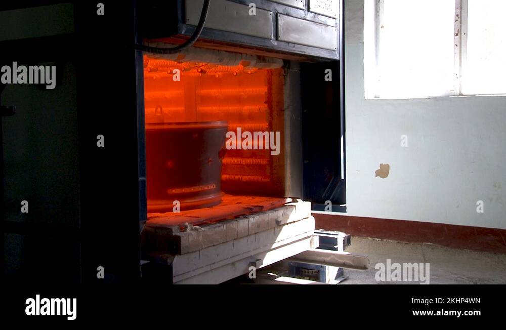 Automatic rolling out of thermal furnace of diffuser body of jet engine ...