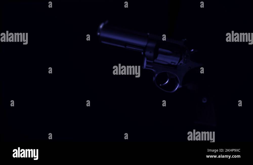 .357 MAGNUM ROTATES IN NEGATIVE SPACE. SIMULATED POLICE LIGHT. 4K, 10 ...