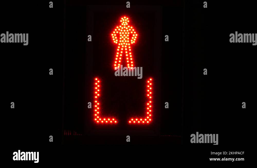 Ungraded: Pedestrian Traffic Light Shows Red "Stop" Signal, and Then ...