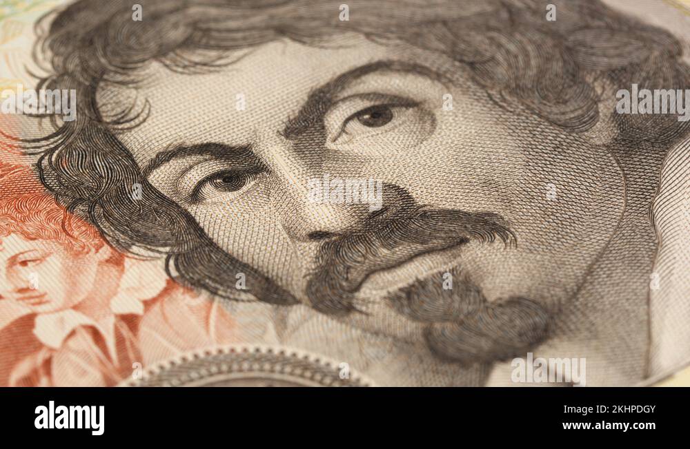 Caravaggio portrait on 100000 italian lire banknote rotating. Low angle ...