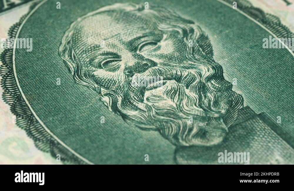 Socrates portrait on Greece 500 drachma (1955) banknote rotating. Low ...