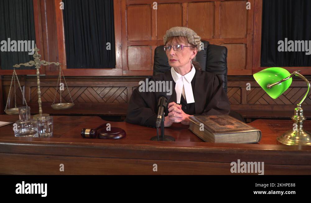 Female Judge calling order and hitting the gavel in a Court / courtroom ...