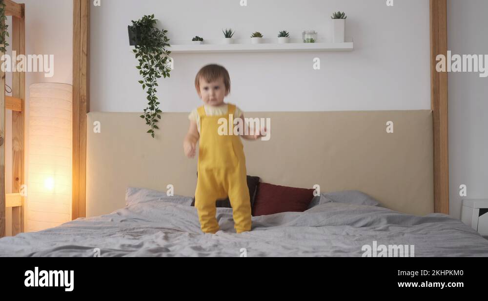 Baby girl jumping Stock Videos & Footage - HD and 4K Video Clips - Alamy