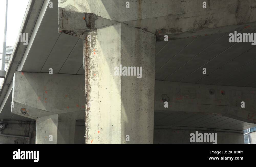 Crumbling and decaying city highway and bridge concrete infrastructure ...