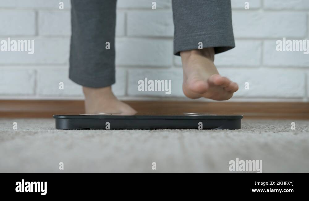Waist scale Stock Videos & Footage - HD and 4K Video Clips - Alamy