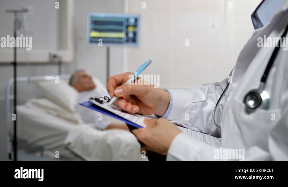 Doctor writing in patient chart Stock Videos & Footage - HD and 4K ...