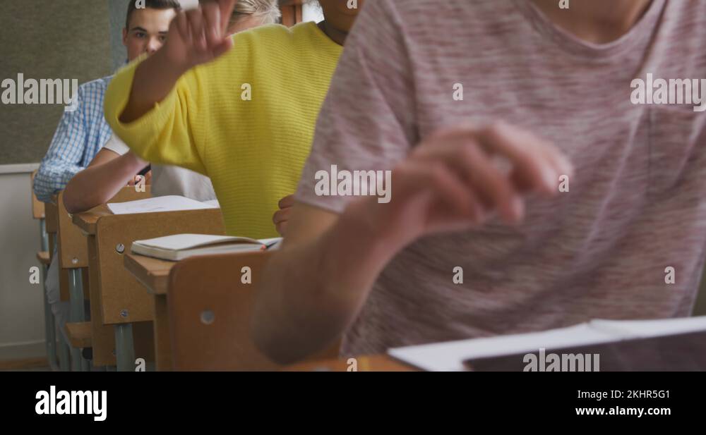 Student raising hands in class Stock Videos & Footage - HD and 4K Video ...