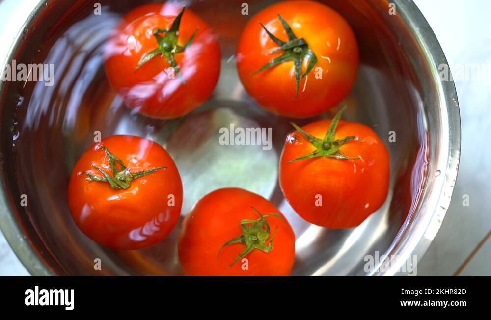 Tomato drop water Stock Videos & Footage - HD and 4K Video Clips - Alamy