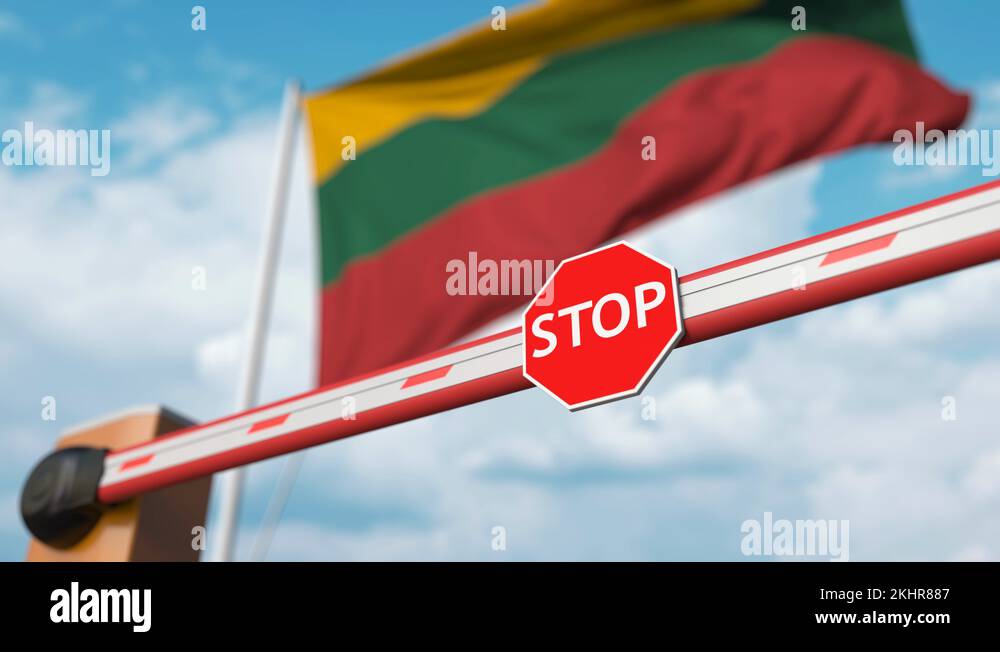 Opening boom barrier with stop sign against the Lithuanian flag. Free ...