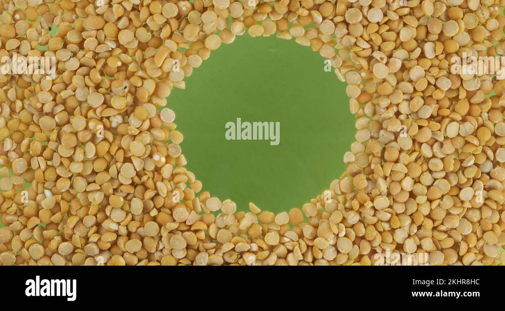 Rotation of peas grains scattered in a circle with space in the center ...