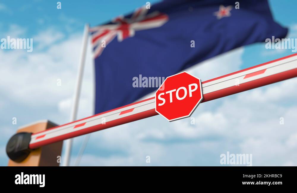 Opening boom barrier with stop sign against the flag. Free border ...