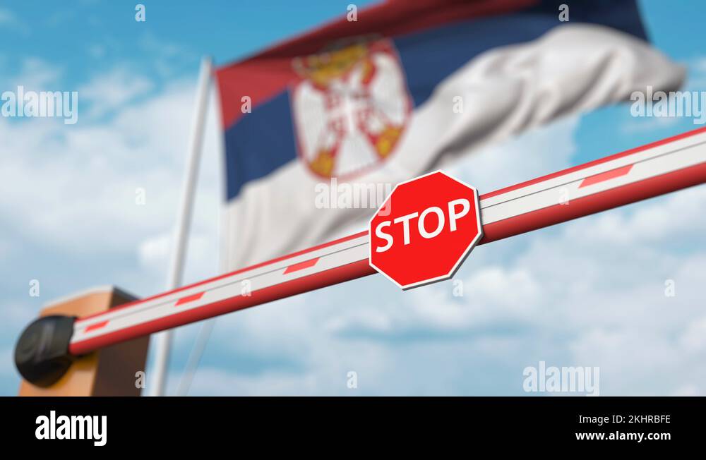Opening boom barrier with stop sign against the Serbian flag. Free ...