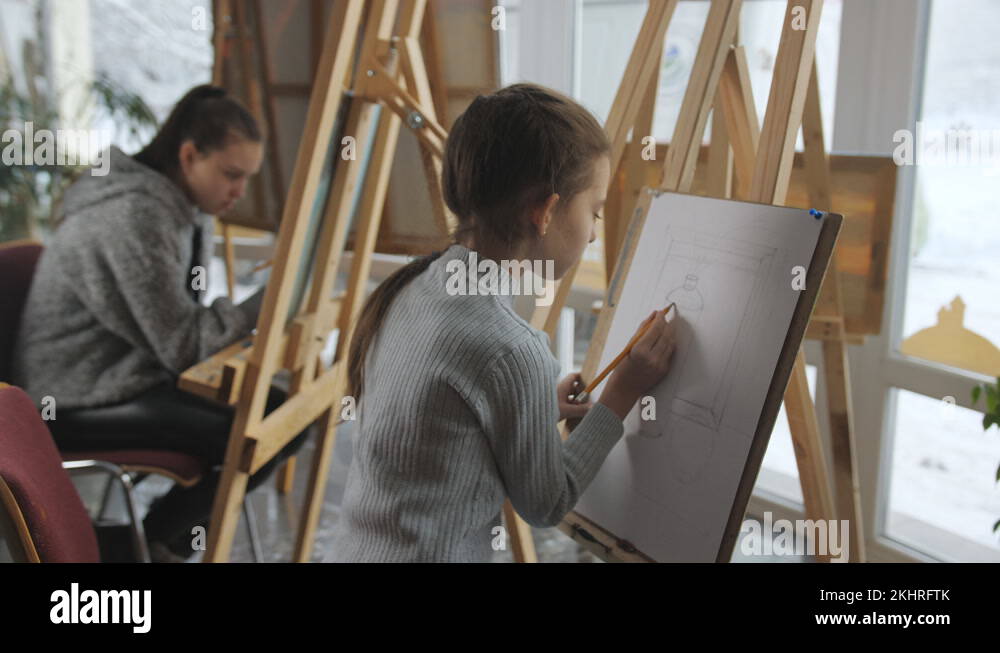 Girls in the art Studio learning to draw still life. Girls do the ...