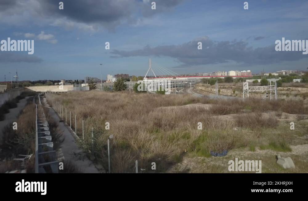 Bari, rail track pass through under suspended bridge Stock Video ...