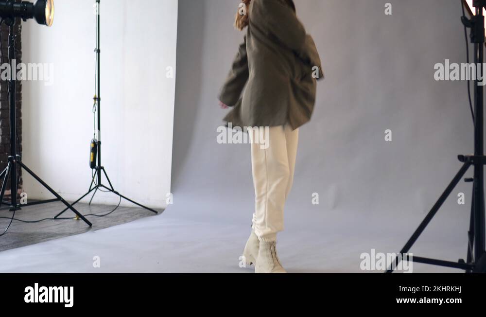 Female model posing at studio during photo shoot Stock Video Footage ...