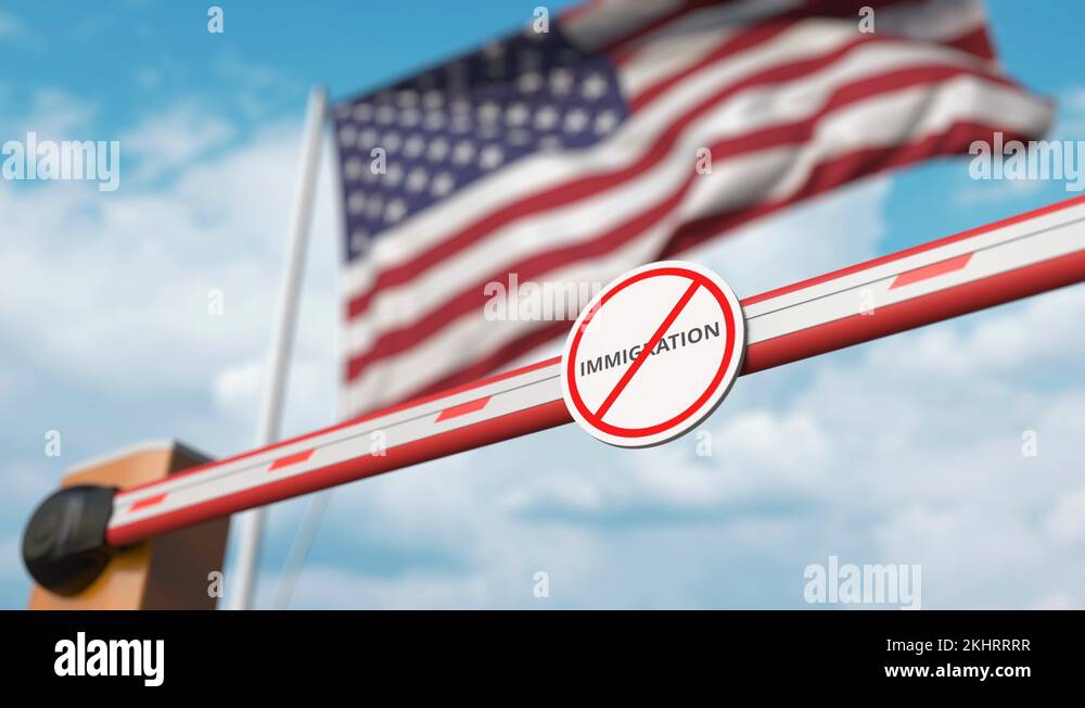 Opening boom barrier with stop immigration sign against the American ...
