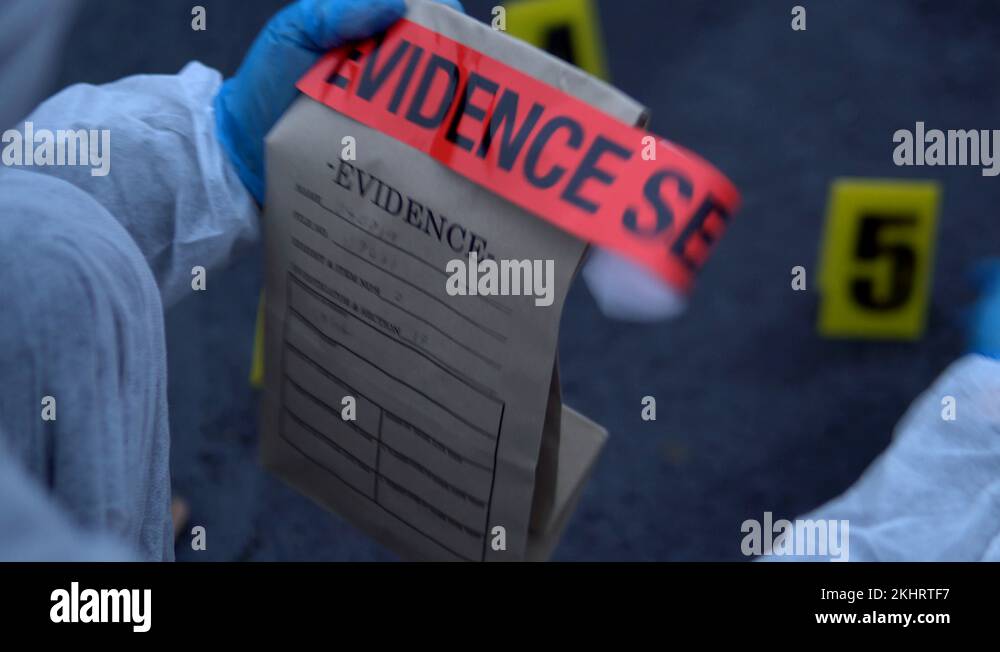 Crime Scene Investigator Seals Evidence Bag, Street Murder, Forensics ...