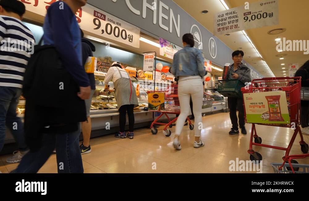 Asian people at Korean supermarket, cooked food stalls Stock Video ...