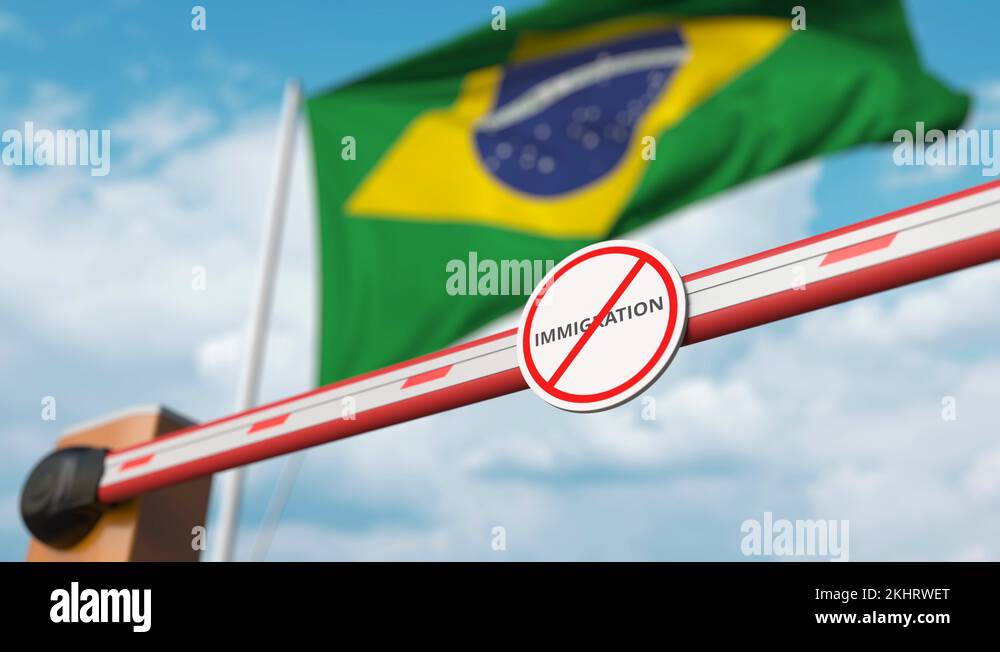 Open boom gate with no immigration sign on the Brazilian flag ...