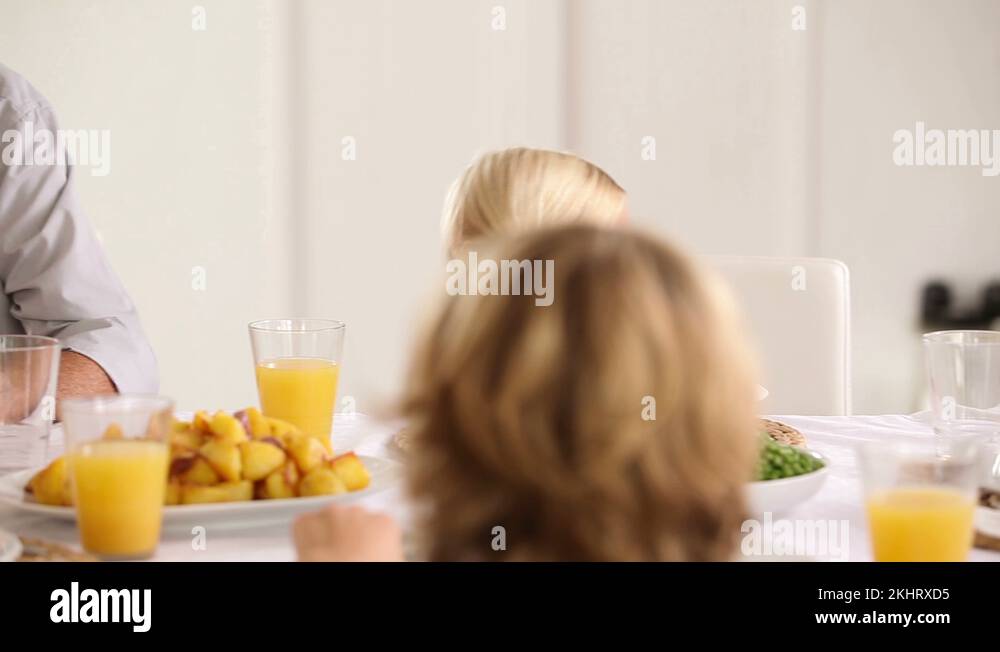 Talking with family at dinner table Stock Videos & Footage - HD and 4K ...