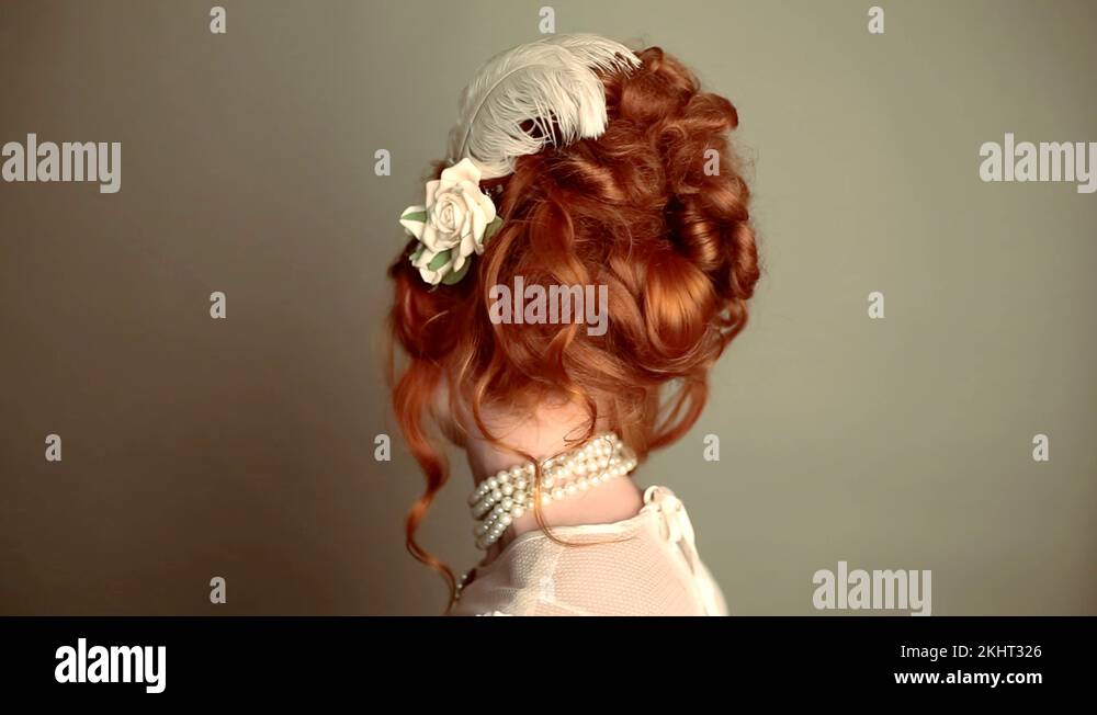 Edwardian hairstyle. Young vampire woman with long curly hair Stock ...