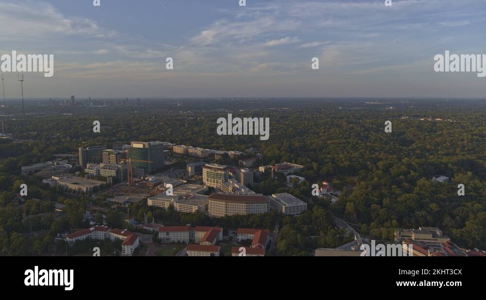 Atlanta Aerial v560 Panning sunset cityscape from near CDC, Emory ...