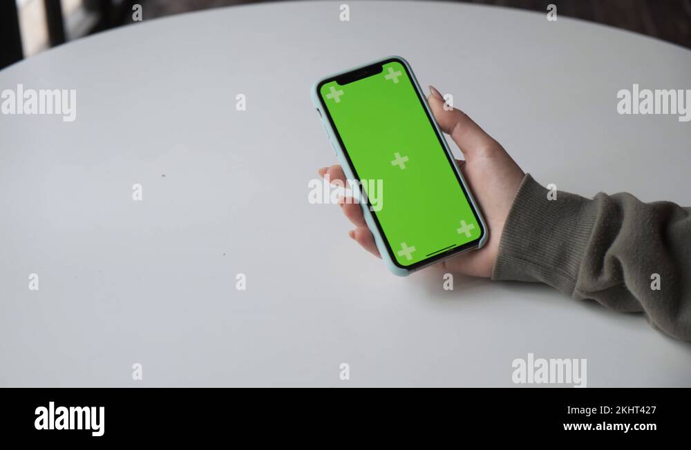 Mobile phone with green screen close up. Chroma key on the cell phone ...