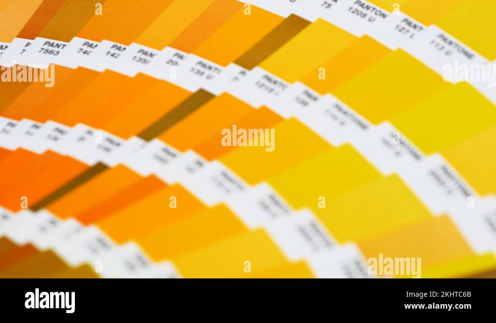 PANTONE spot color swatches in DTP studio, rack focus closeup, prepress ...