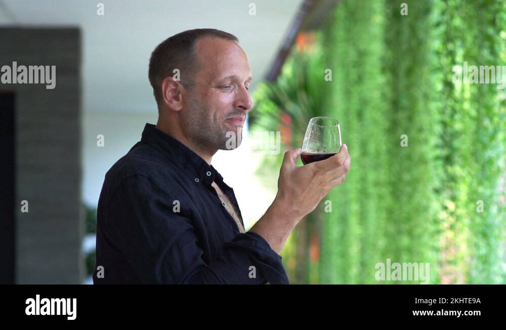 Man holding drink Stock Videos & Footage - HD and 4K Video Clips - Alamy