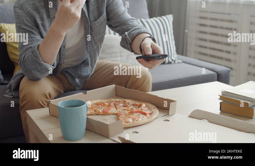 Man eating pizza tv Stock Videos & Footage - HD and 4K Video Clips - Alamy