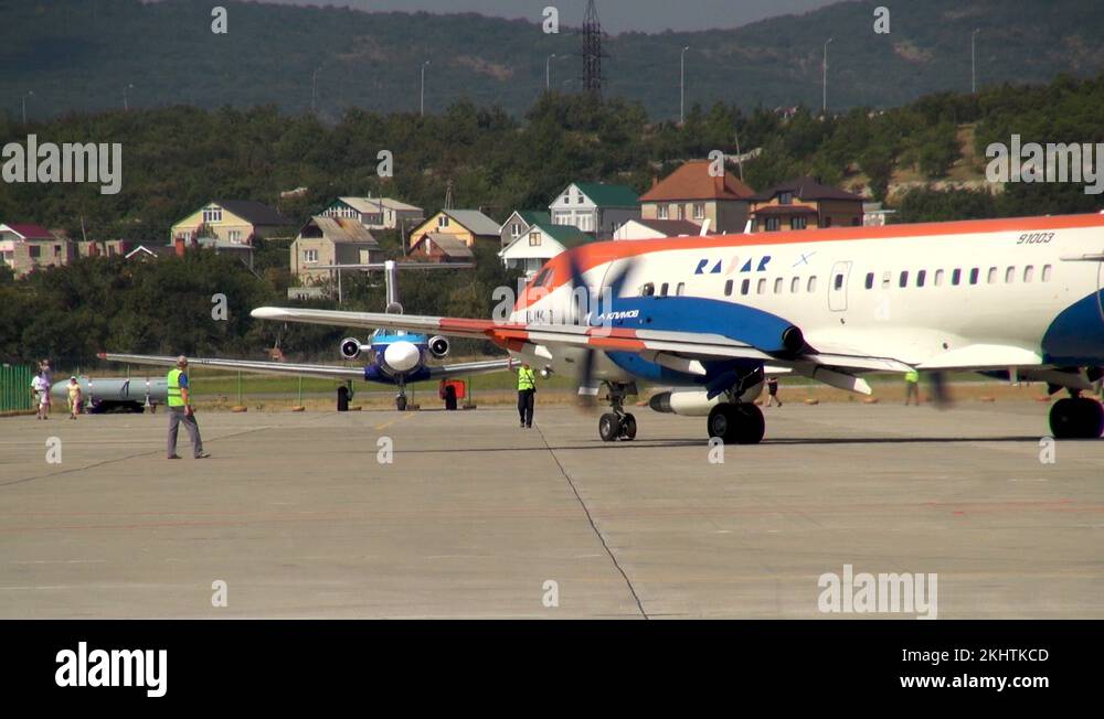 IL-114 - Russian turboprop aircraft moves towards runway for takeoff ...