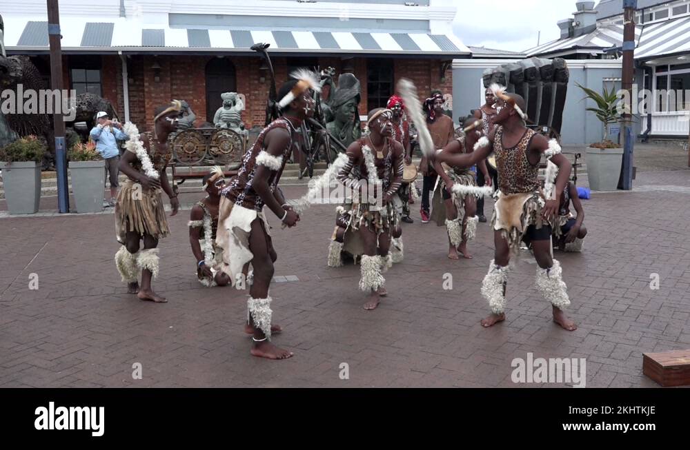 African men with painted faces dancing ethnic dances in Cape Town Stock ...