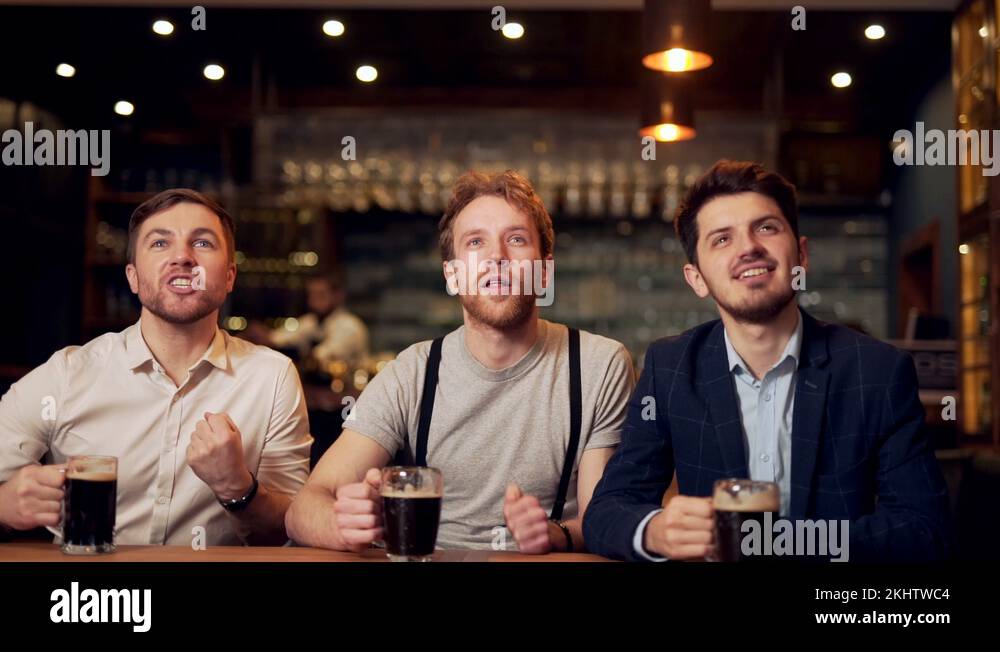 Men cheering in pub Stock Videos & Footage - HD and 4K Video Clips - Alamy