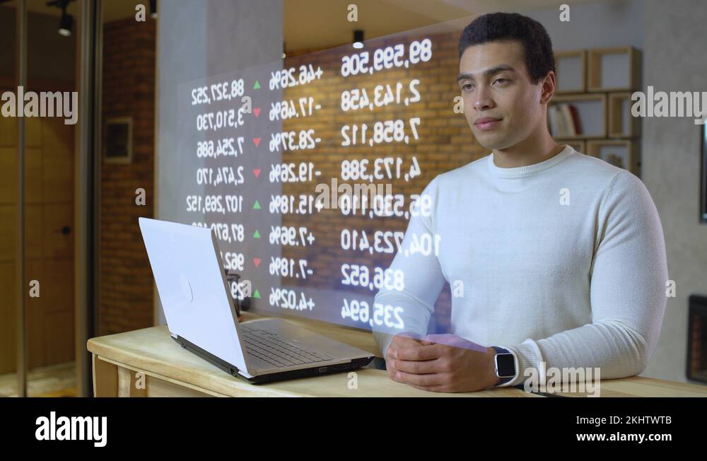 Stock market hologram, financial analyst working with chart projections ...