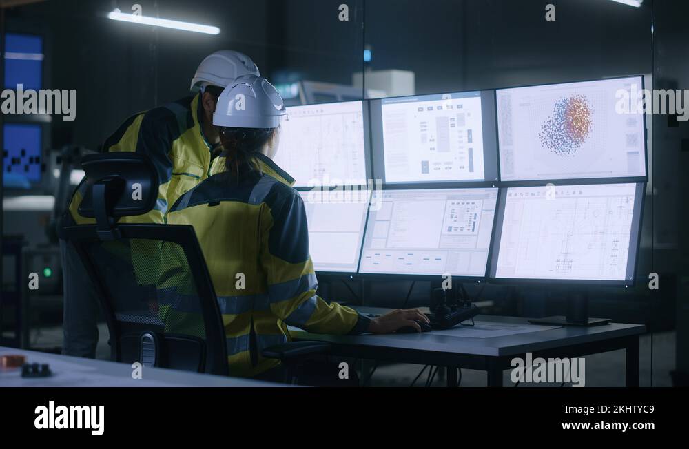 Industry 4.0 Modern Factory: Project Engineer Talks to Female Operator ...