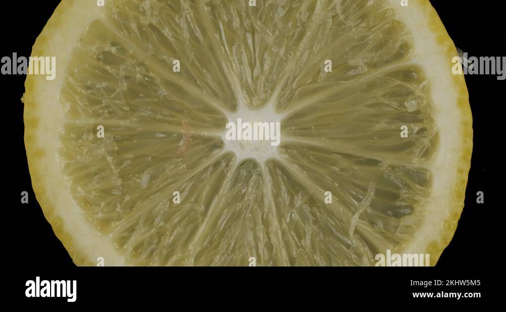 Rotation, closeup of fresh, juicy pulp of an lemon. Background and ...